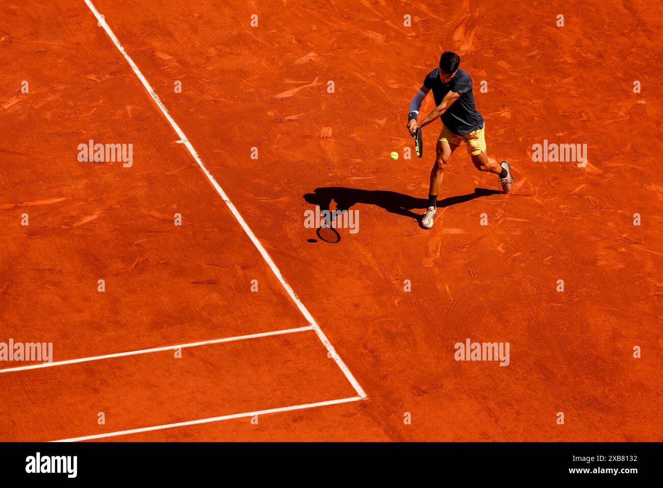 Tennis player Carlos Alcaraz from Spain is in action during the men’s ...