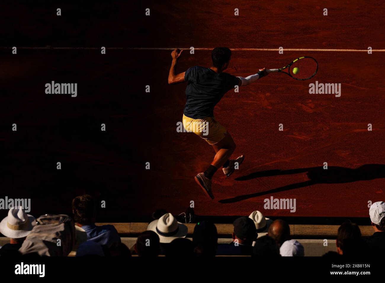 Tennis player Carlos Alcaraz from Spain is in action during the men’s ...