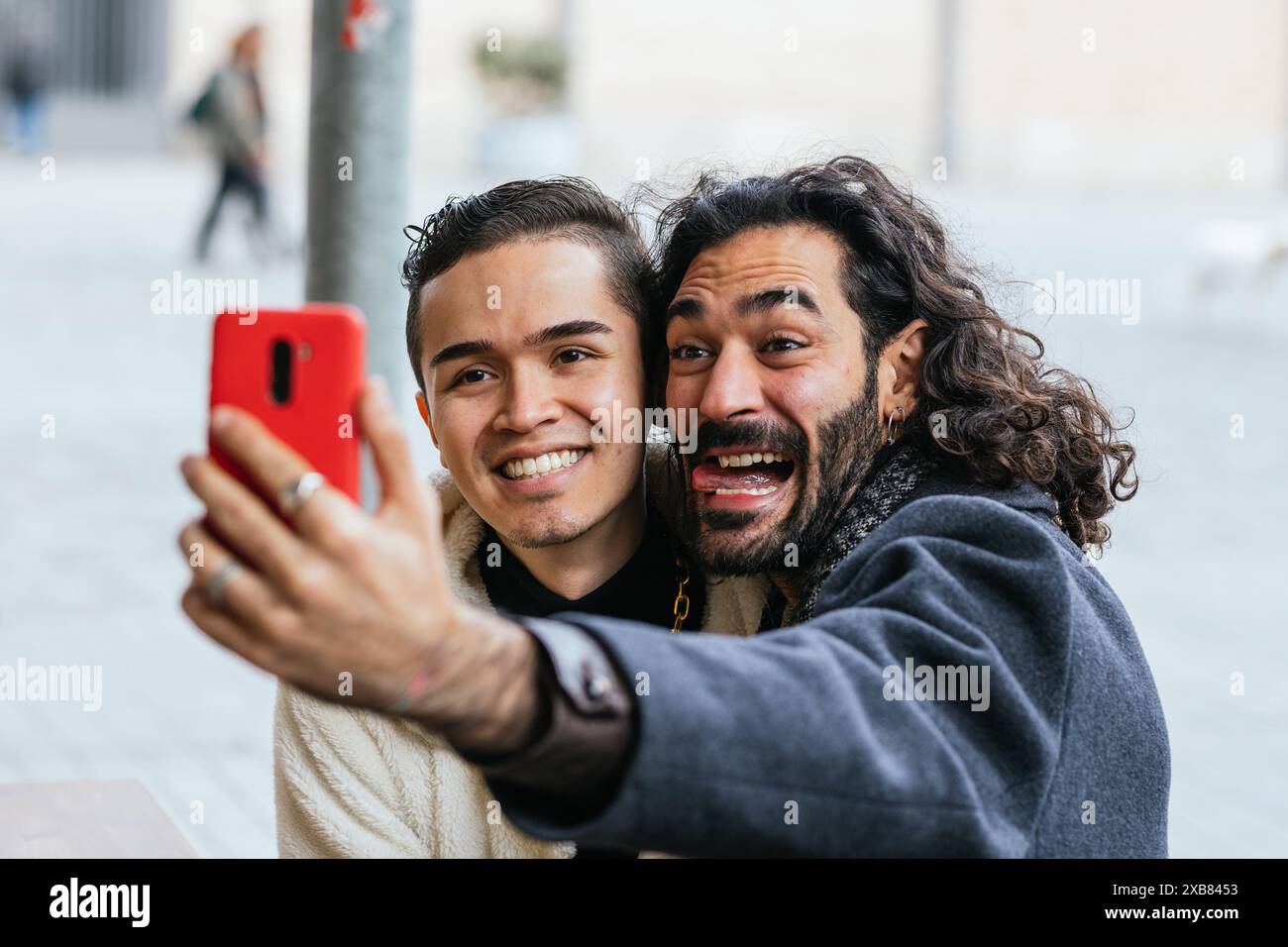 Two men taking a selfie with a cell phone Stock Photo - Alamy