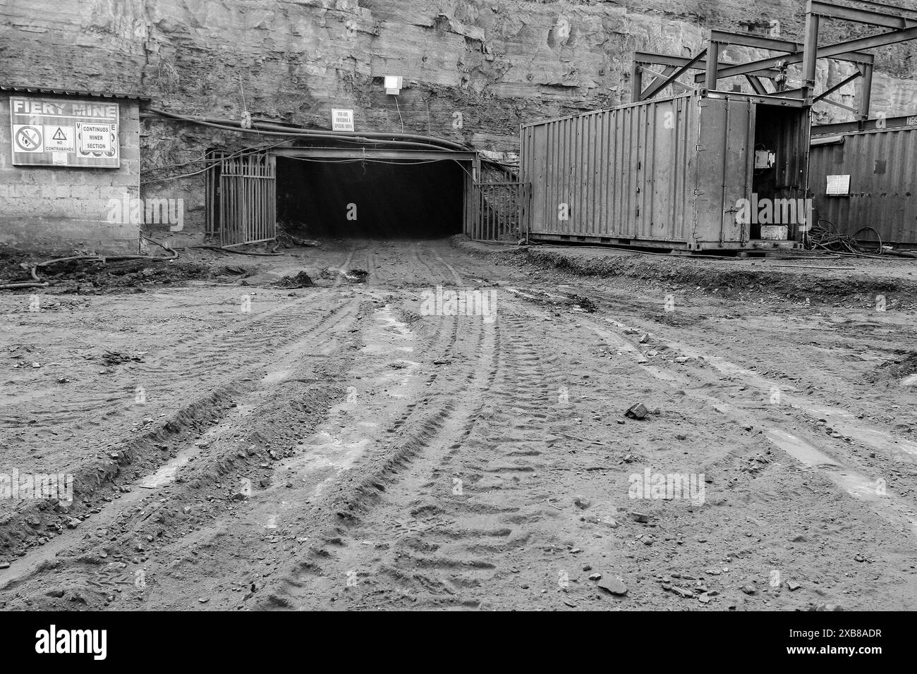 Dirt tracks in front of a train station Stock Photo - Alamy