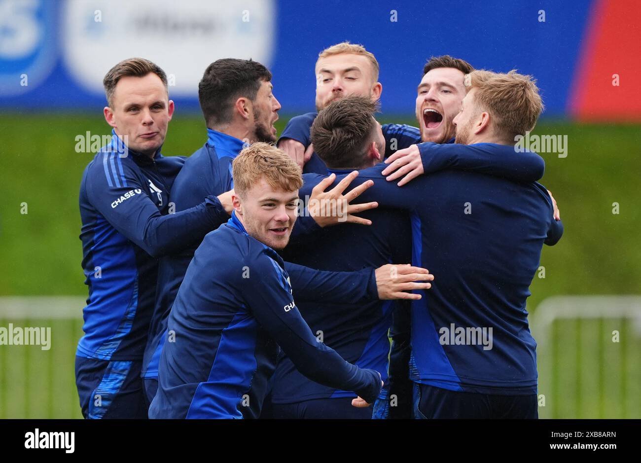 Left to right, Scotland's Lawrence Shankland, Scott McKenna, Tommy ...