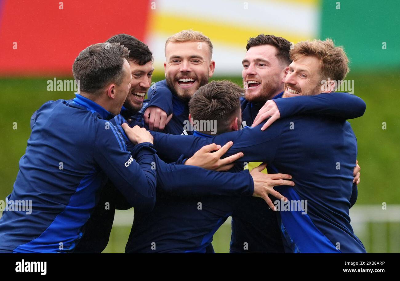 Left to right, Scotland's Lawrence Shankland, Scott McKenna, Ryan ...