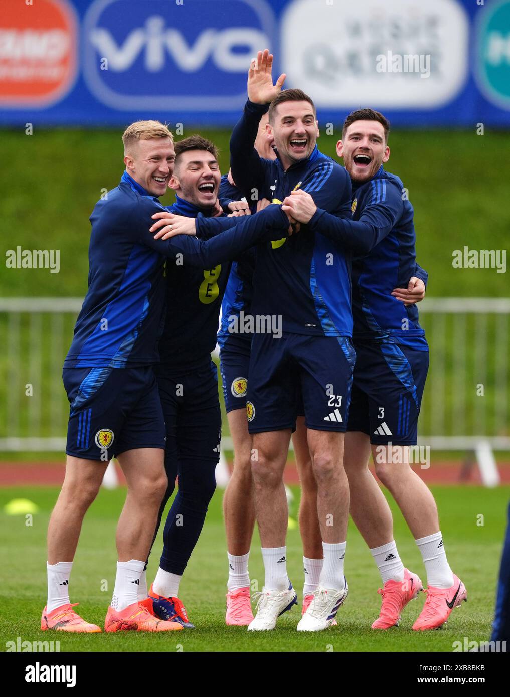 Left to right, Scotland's Lewis Ferguson, Billy Gilmour, Jack Hendry ...