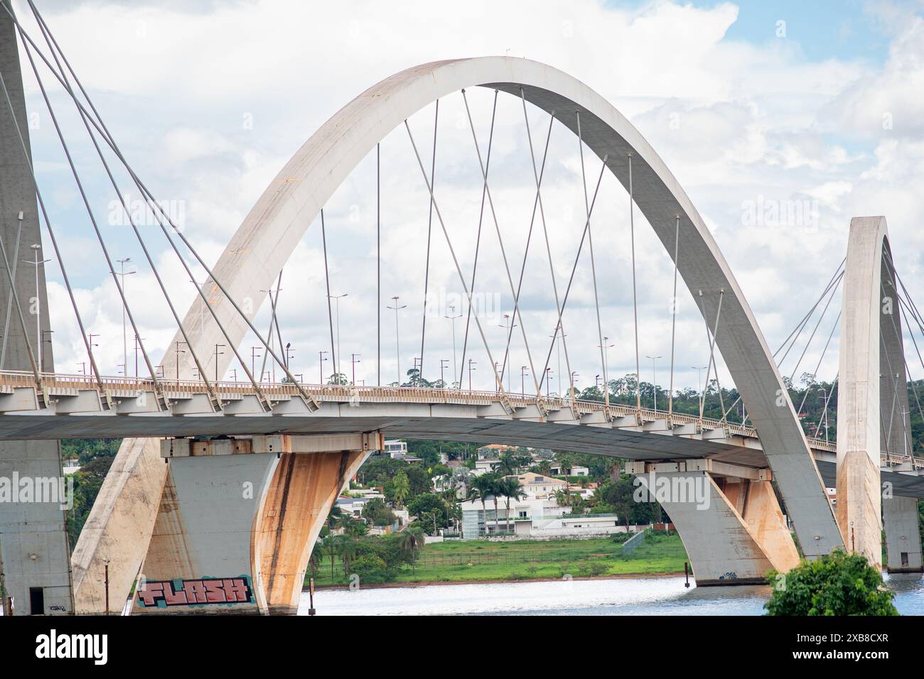 A bridge over water with boats passing through Stock Photo - Alamy