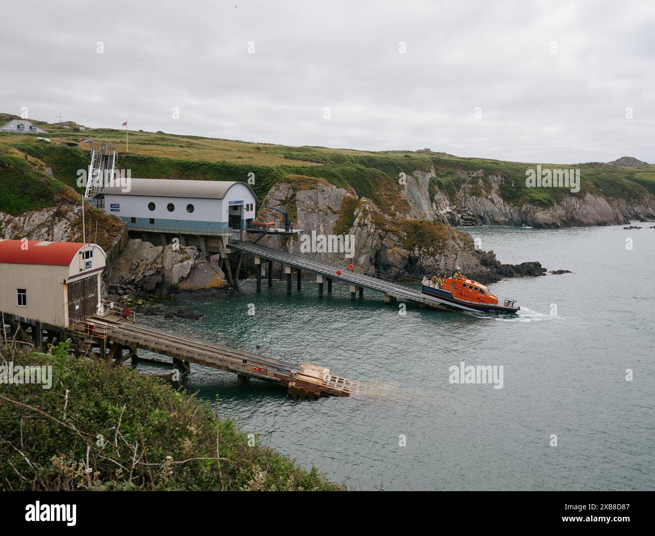 The new and old RNLI St Davids Lifeboat Station and Atlantic Class ...