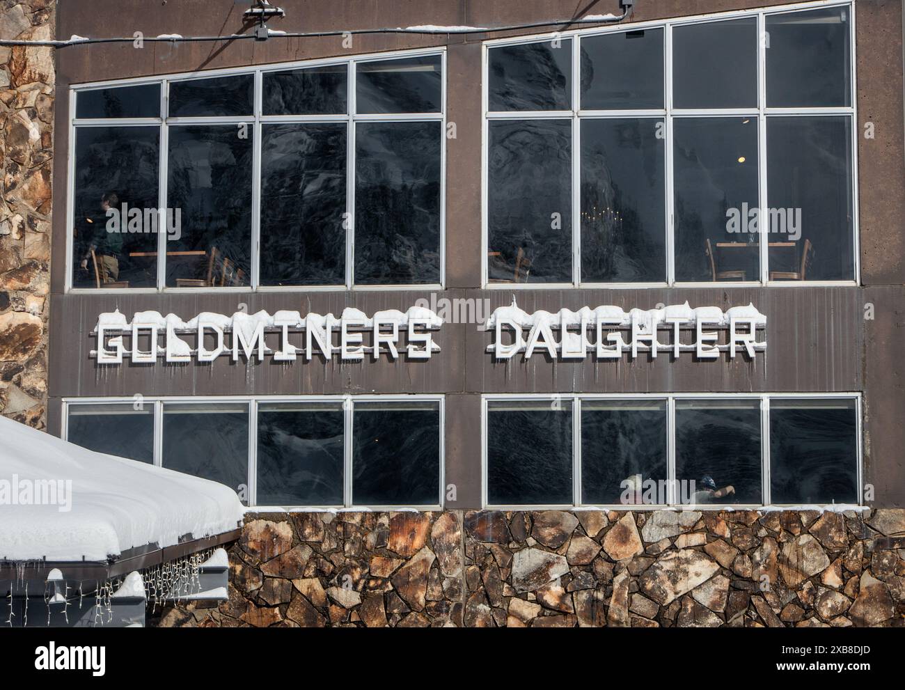 A snow covering ground in front of building Stock Photo - Alamy