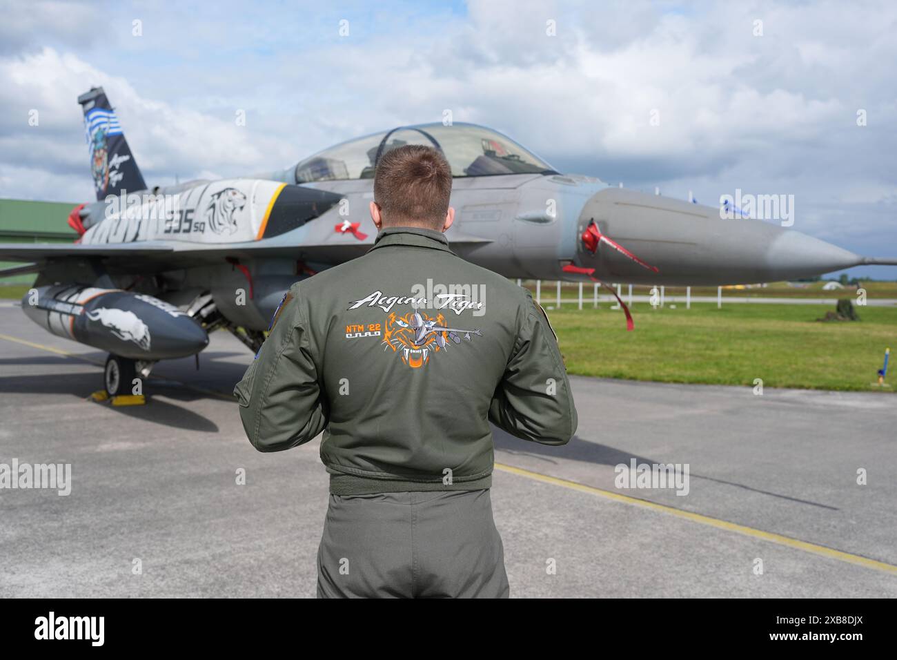 Jagel, Germany. 11th June, 2024. A crew member of an F-16 fighter jet ...