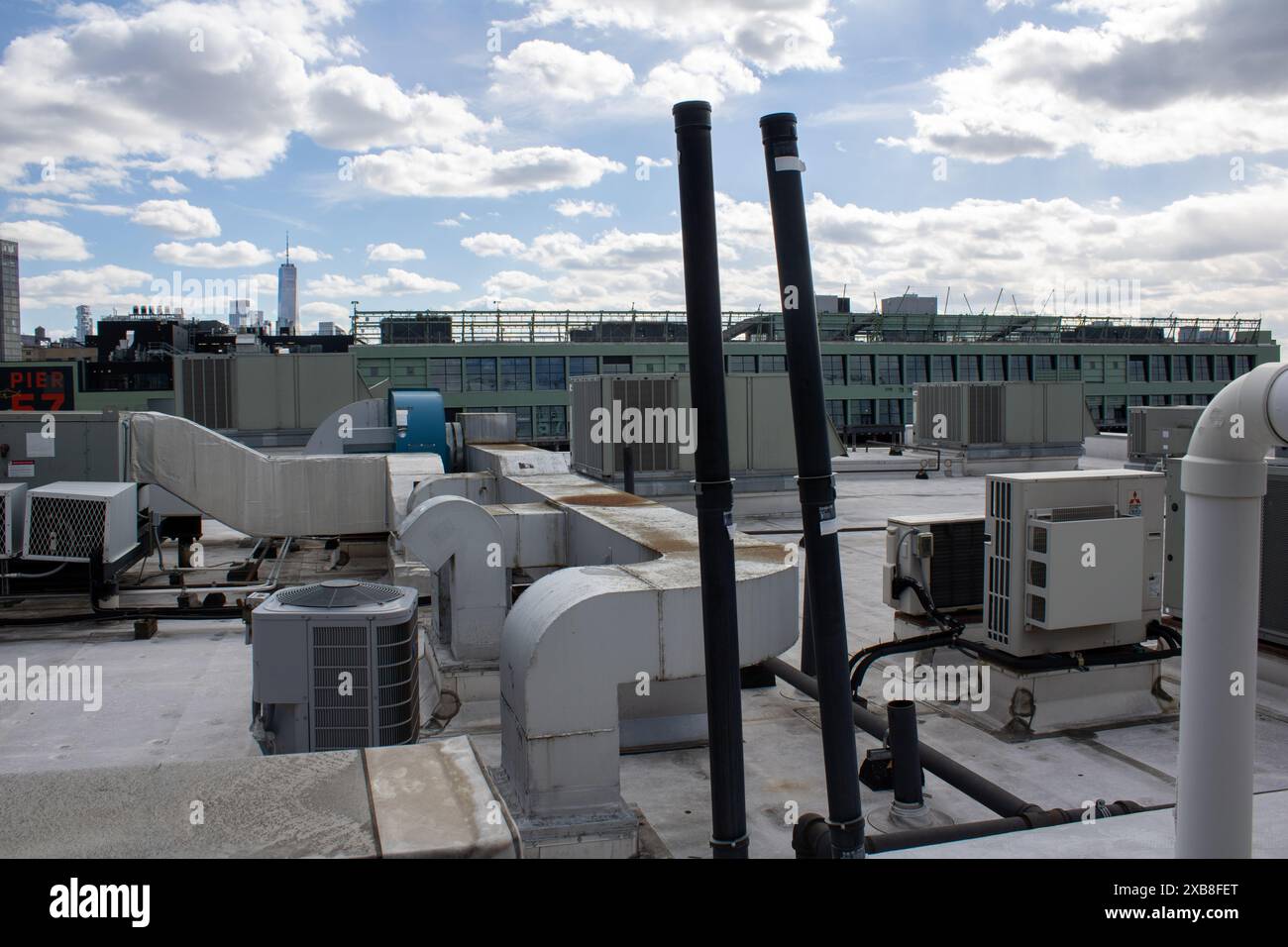 The air conditioning units atop a roof in New York, United States Stock ...