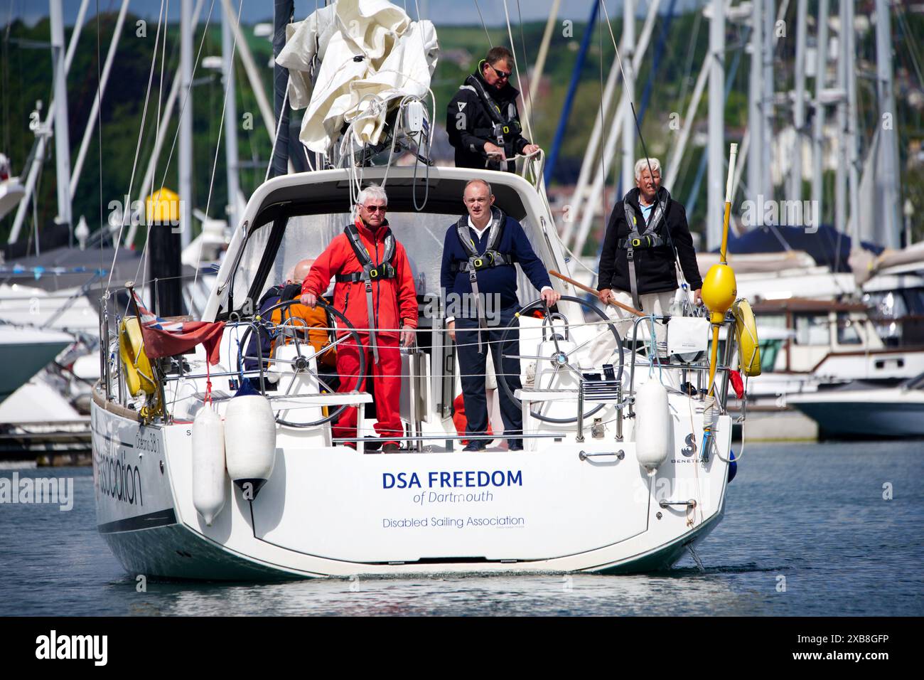 Liberal Democrats leader Sir Ed Davey (centre) on board the Disabled ...