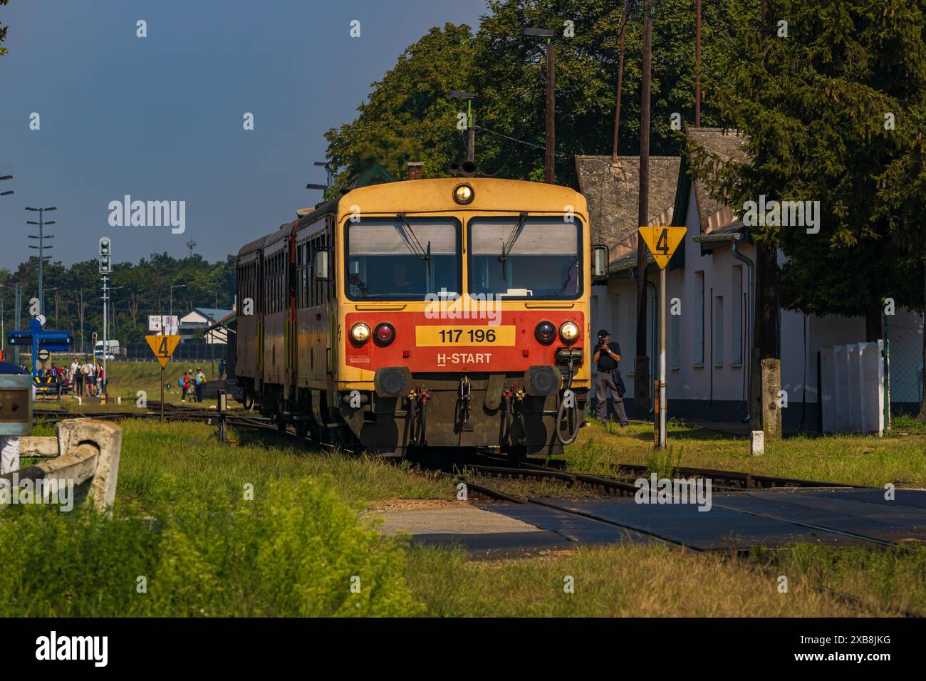 A Bzmot passes out of Tapolca station Stock Photo - Alamy