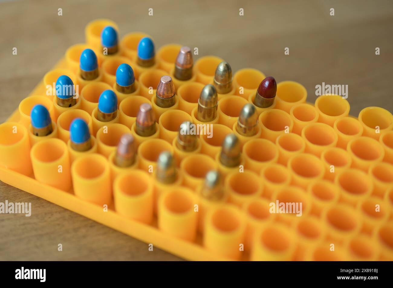 Detail of a tray for placing the cases during the ammunition reloading ...