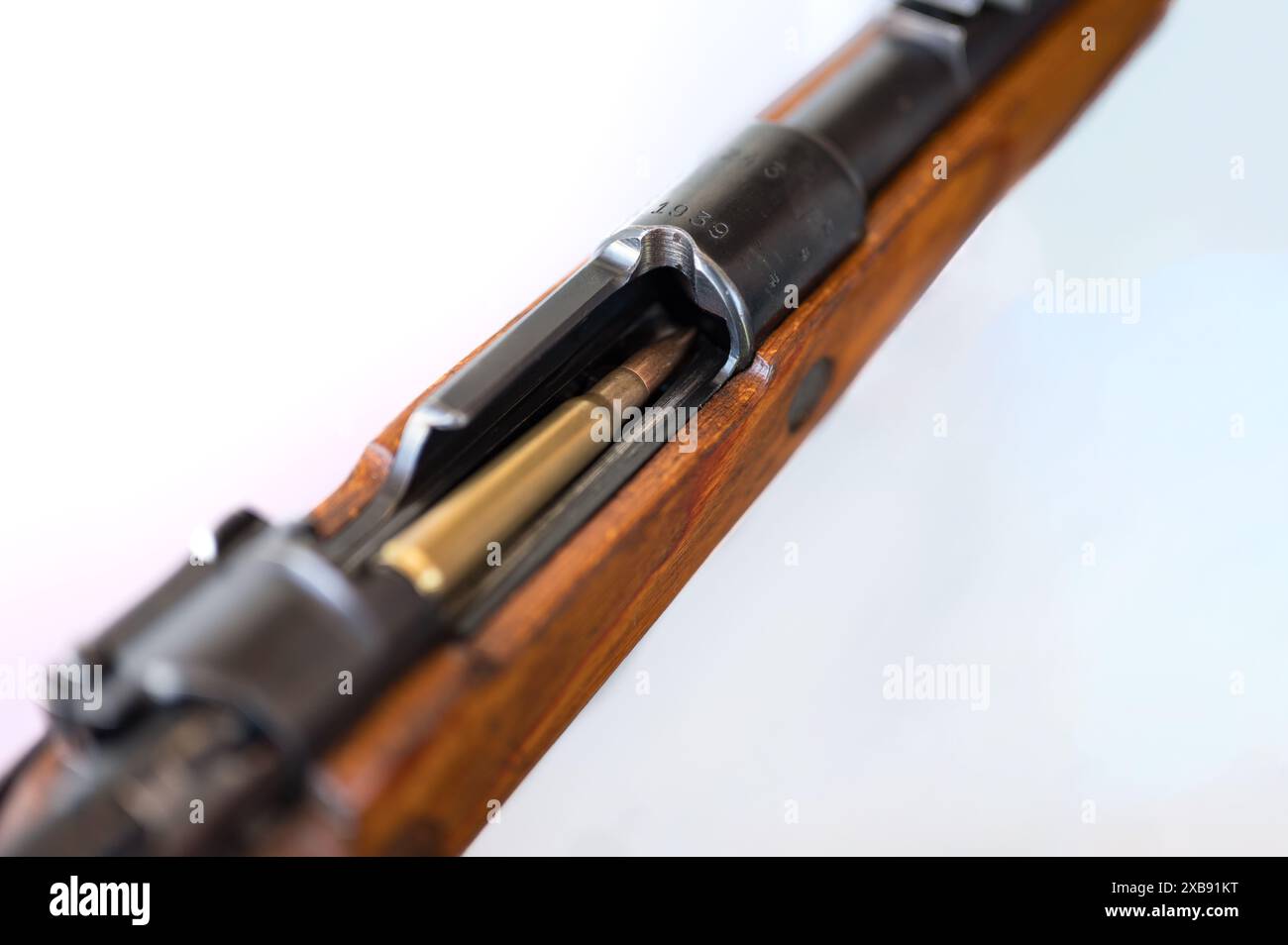 Detail of the introduction of a bullet into the chamber of the Mauser ...