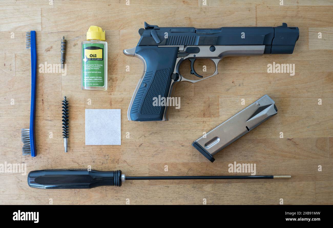 Detail of the cleaning and maintenance tools of a 9mm caliber pistol ...