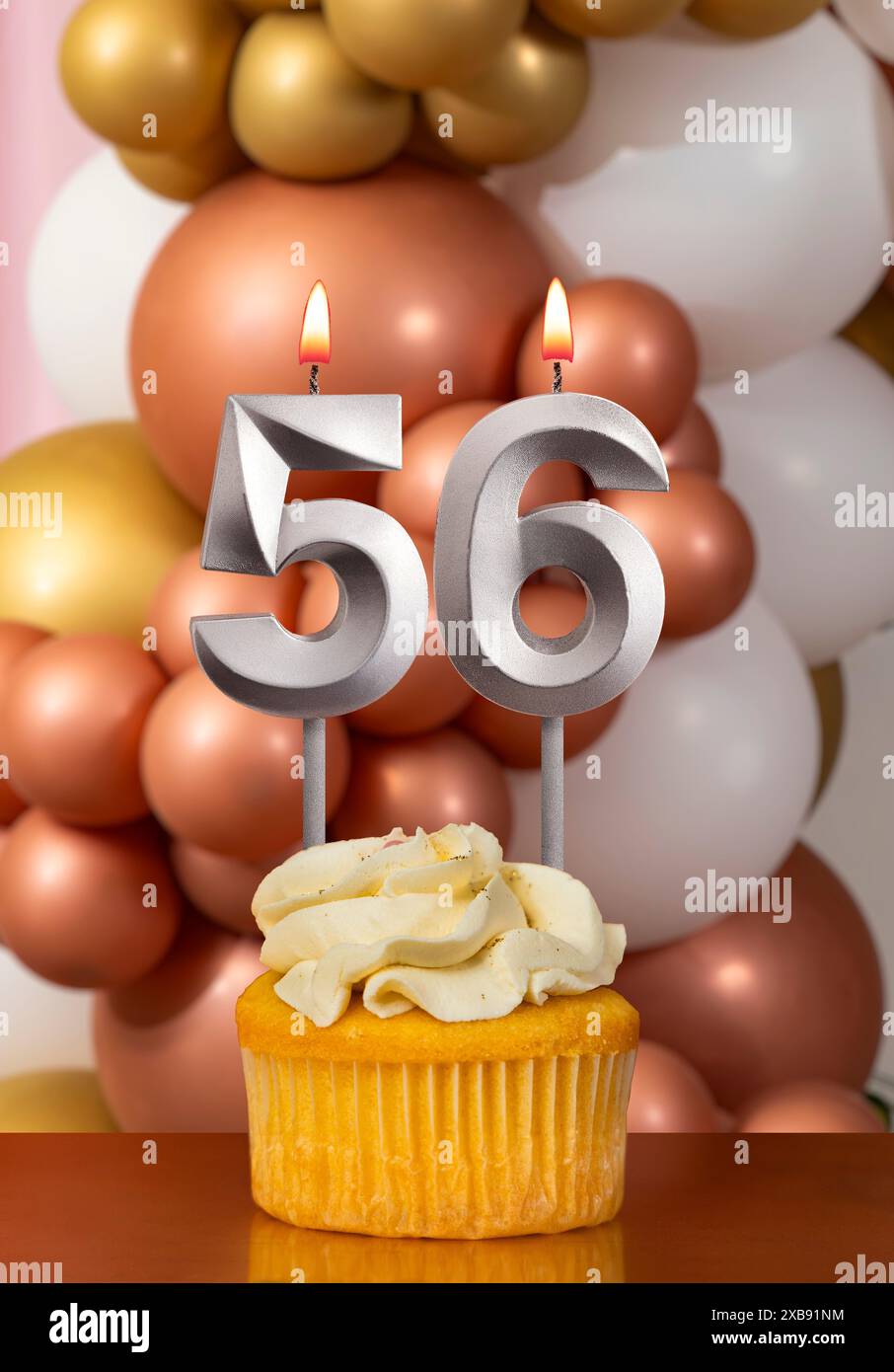 Birthday candle number 56 - Celebration balloons background Stock Photo ...