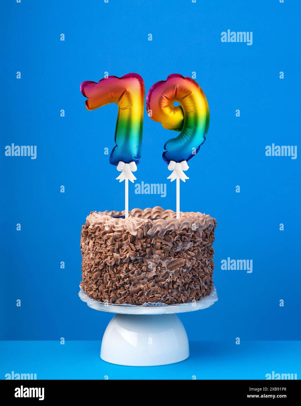 Air balloon number 79 - Birthday cake on blue background Stock Photo ...