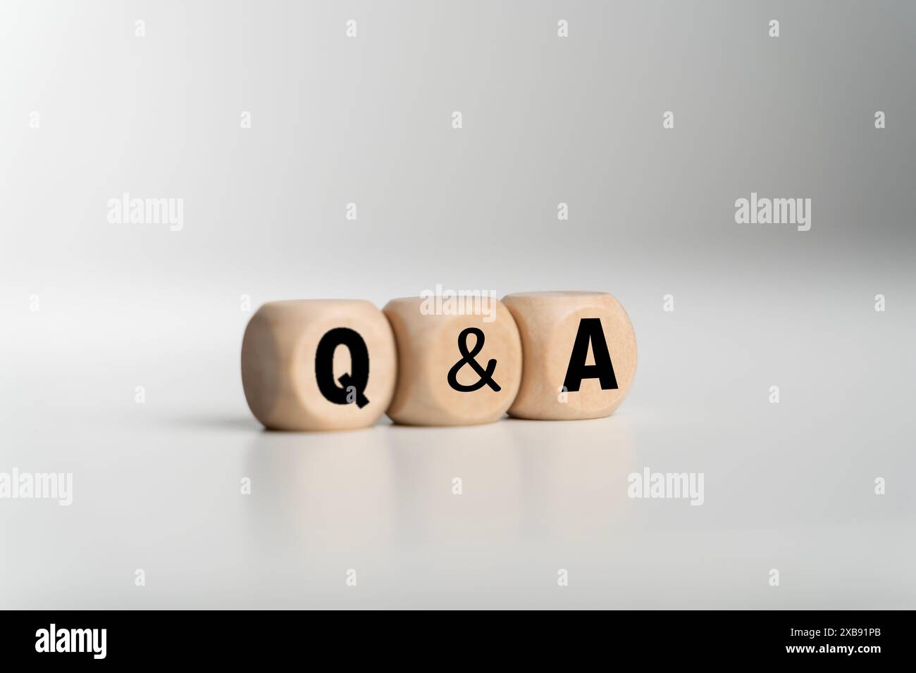 QA - acronym from wooden blocks with letters, questions and answers ...