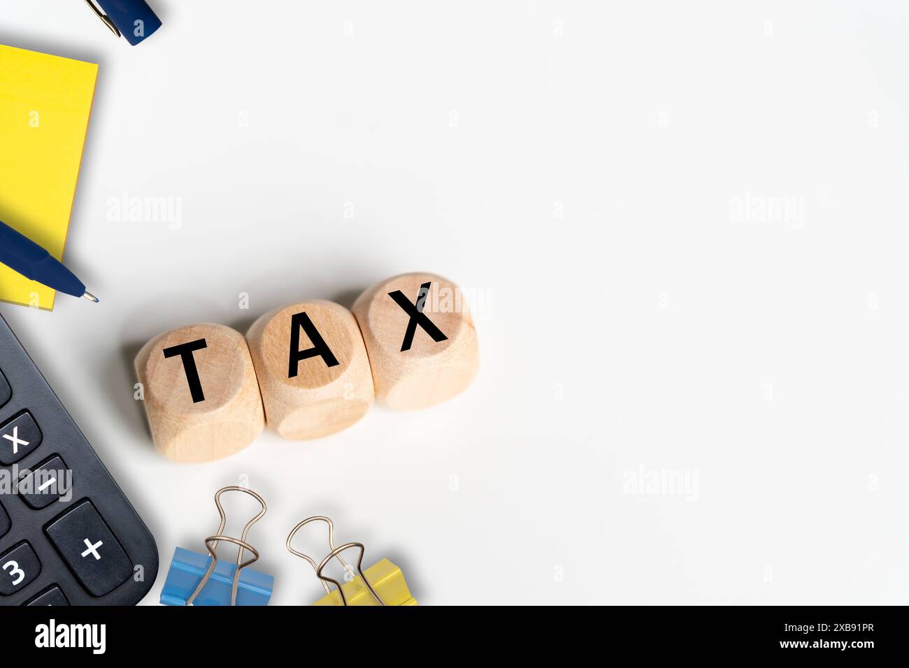 Tax with Saving Bank and wooden block cube concept, , tax payment ...