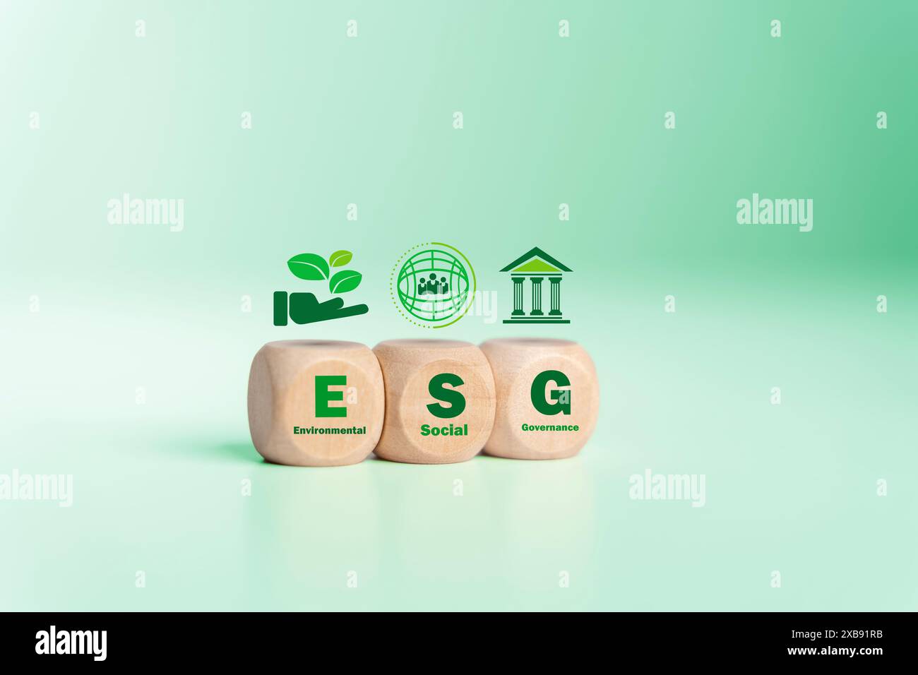 ESG concept regarding environment, social, and governance. Green esg icon symbol on wooden block ...