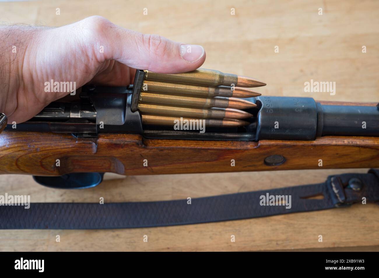 Detail of the insertion of an ammunition clip Stock Photo - Alamy