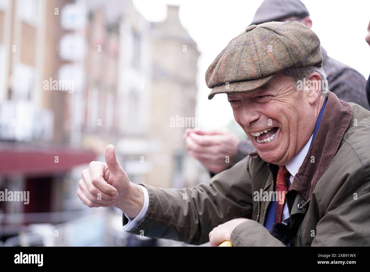 Reform UK leader Nigel Farage on the Reform UK campaign bus in Barnsley ...