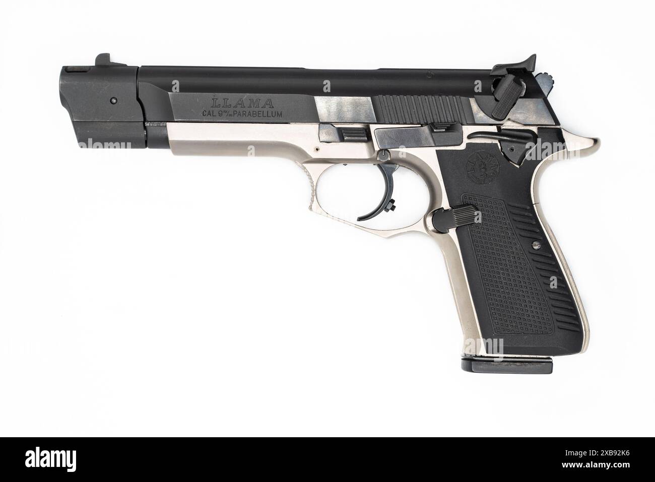 A Llama M-87 semi-automatic pistol with muzzle brake on white ...