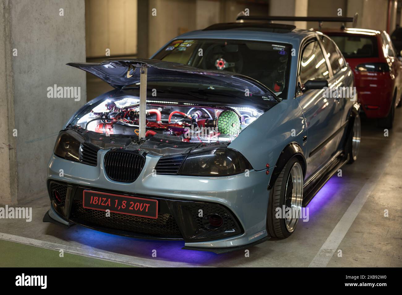 A third generation Seat Ibiza type 6L tuned in a group of modified cars ...
