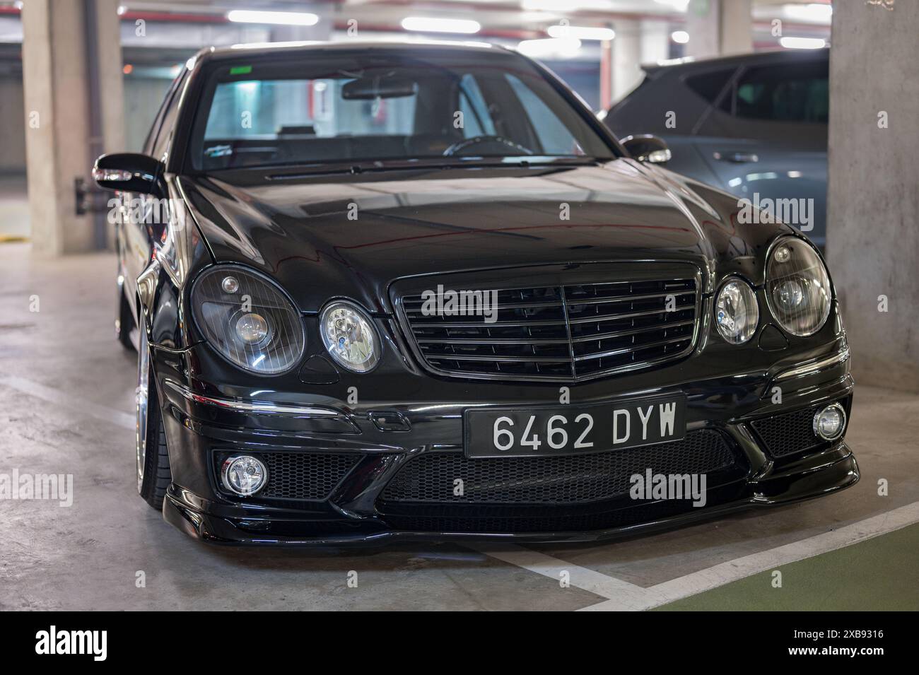 An impressive German luxury car, Mercedes Benz E Class E320 CDI W211, black in Russian mafia ...