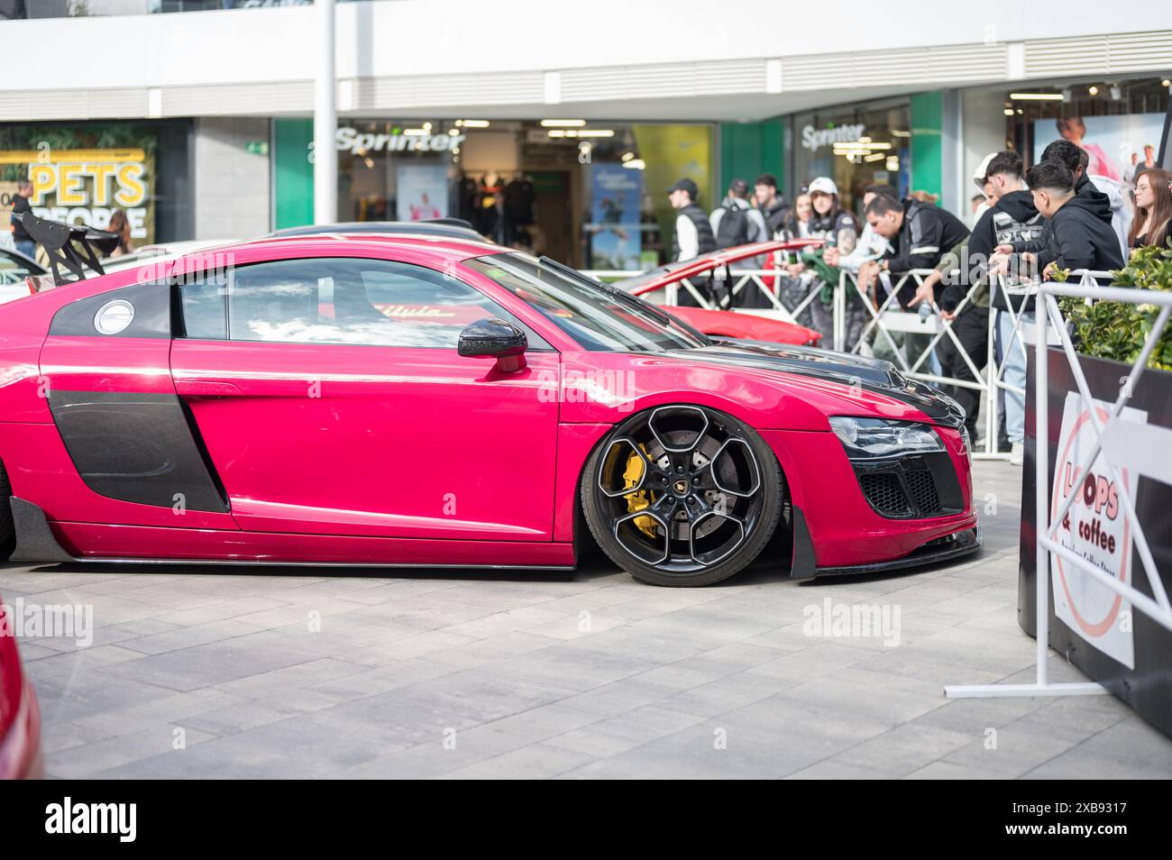 A side view of an impressive Audi R8 supercar with Lamborghini wheels ...