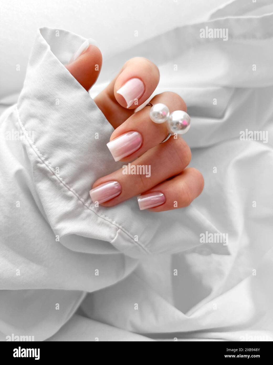 Womans hands adorned pink nail hi-res stock photography and images - Alamy