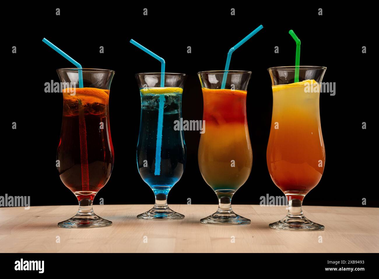 The four assorted beverages arranged in a line Stock Photo - Alamy