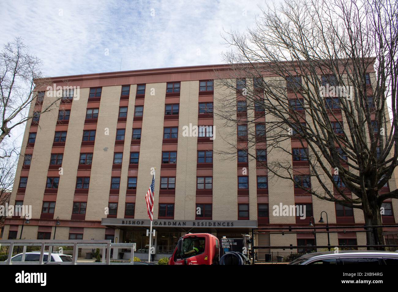 School building beside a leafless tree Stock Photo - Alamy