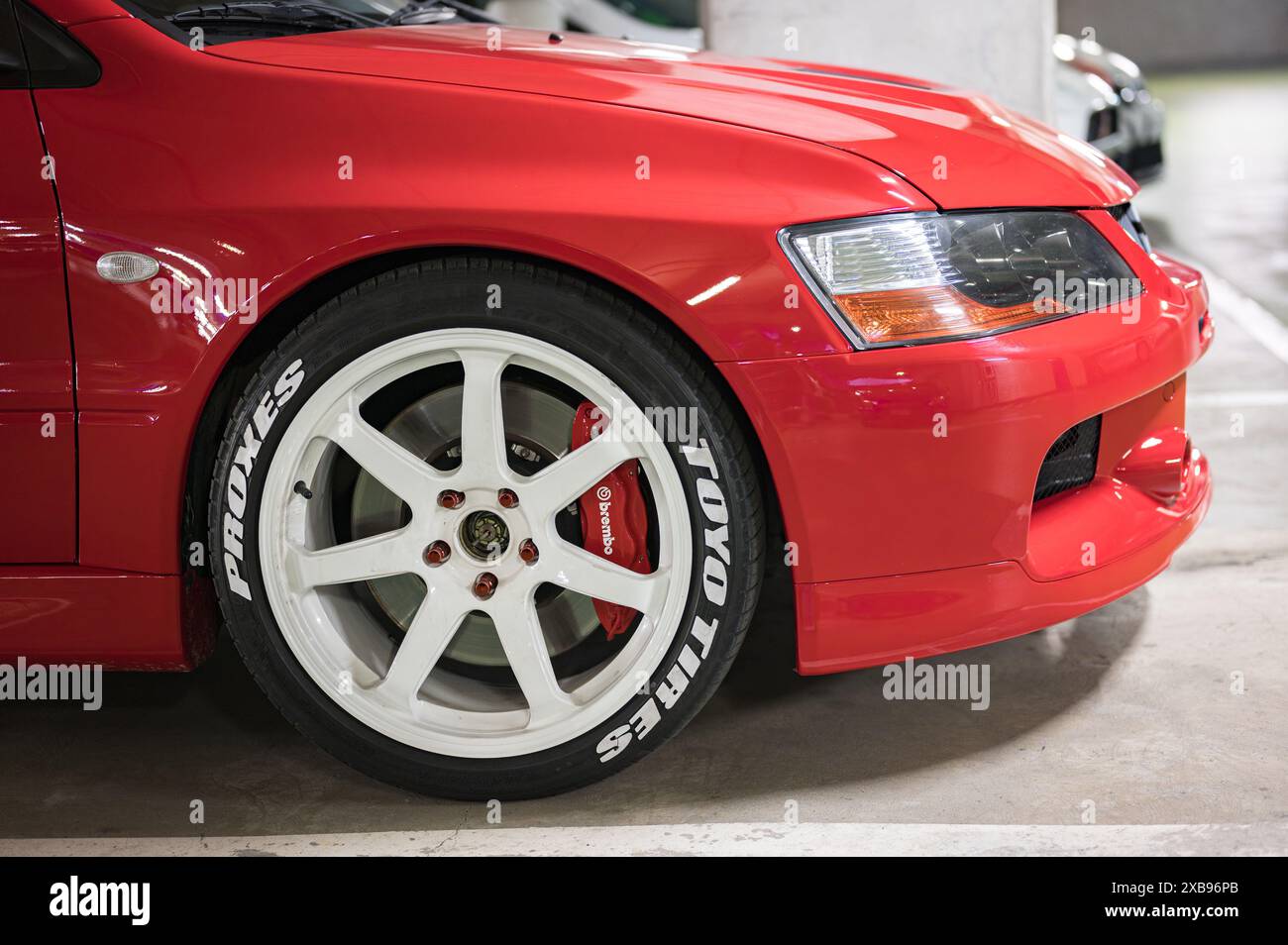Detail of the light white sports rim, Toyo Tires Proxes sports tires ...