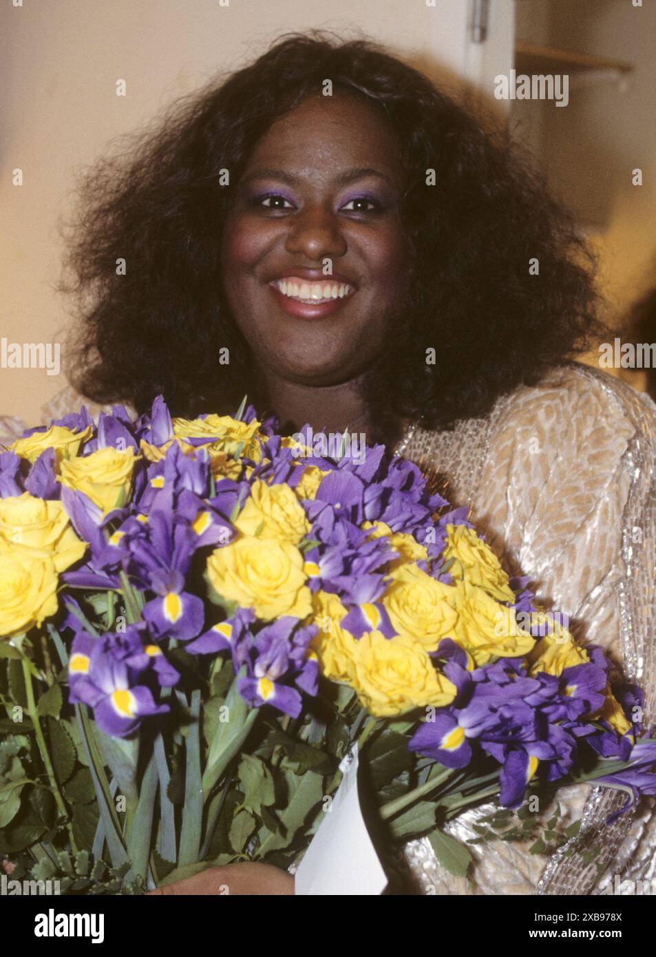 JENNIFER HOLLIDAY American singer after concert with flower in ...