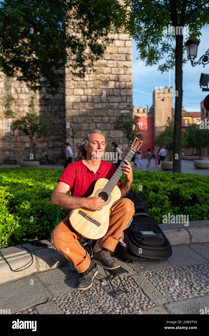 Man plucking guitar hi-res stock photography and images - Alamy
