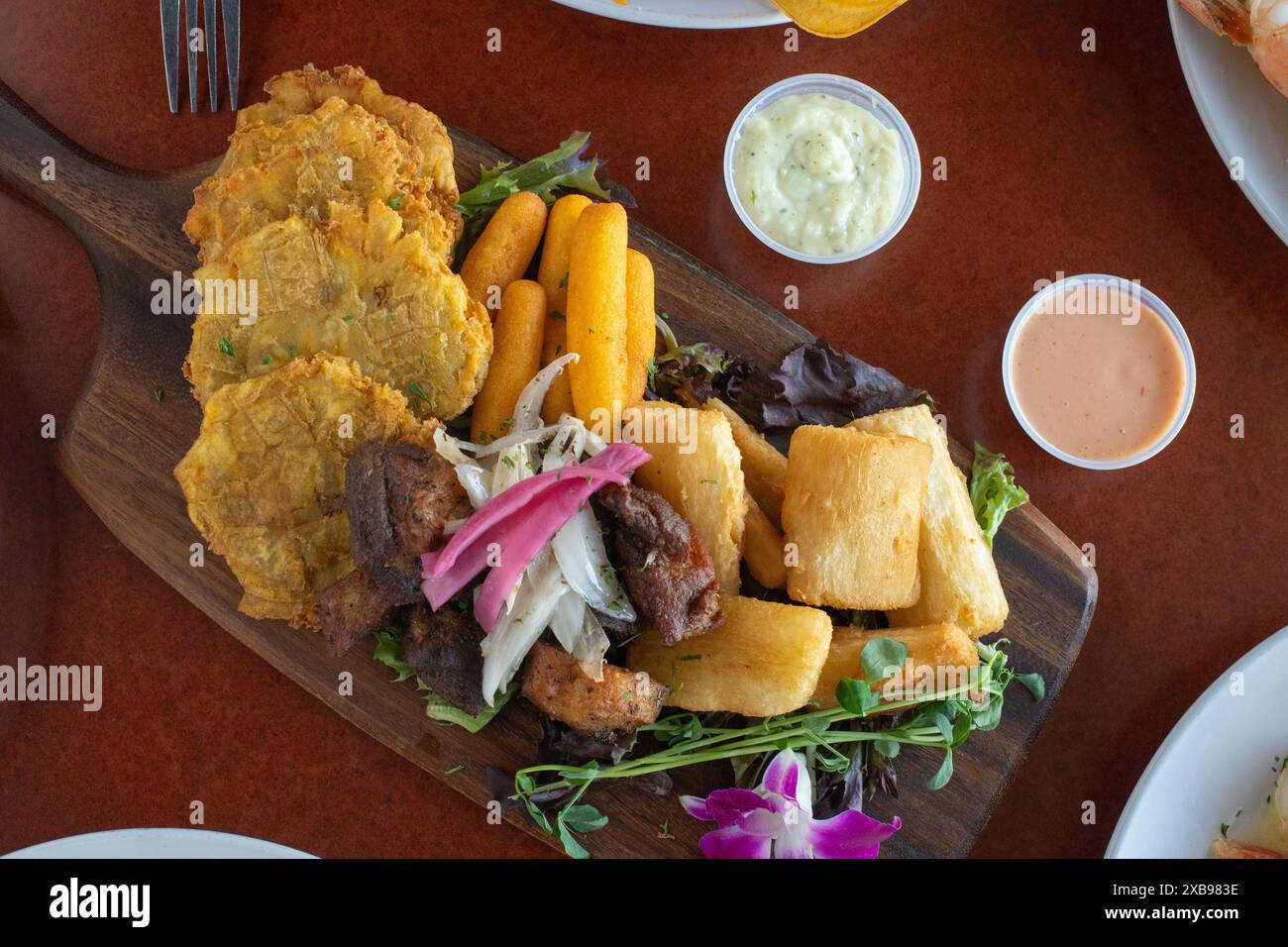 Assorted bread, bagel, and dips on display Stock Photo - Alamy