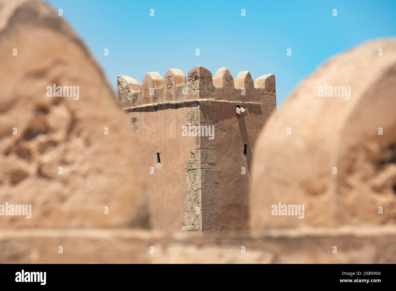 Detail of a stone tower, part of the battlements of the Kasbah of Sfax ...