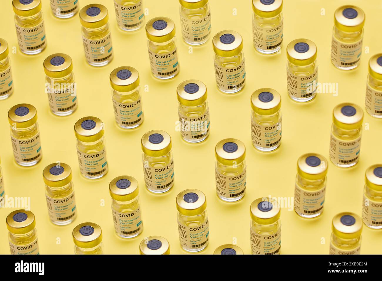 Vials, covid 19 and liquid for healthcare in studio, treatment and ...