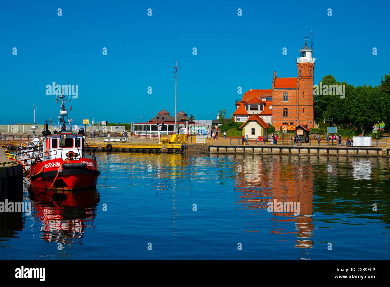 2022-06-02 Historic lighthouse building at shoreline Slupia river in ...