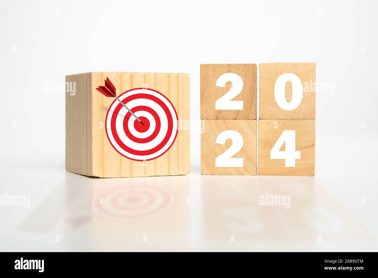 2024 Year wooden cubes with dart and target icon. Goal, Target ...