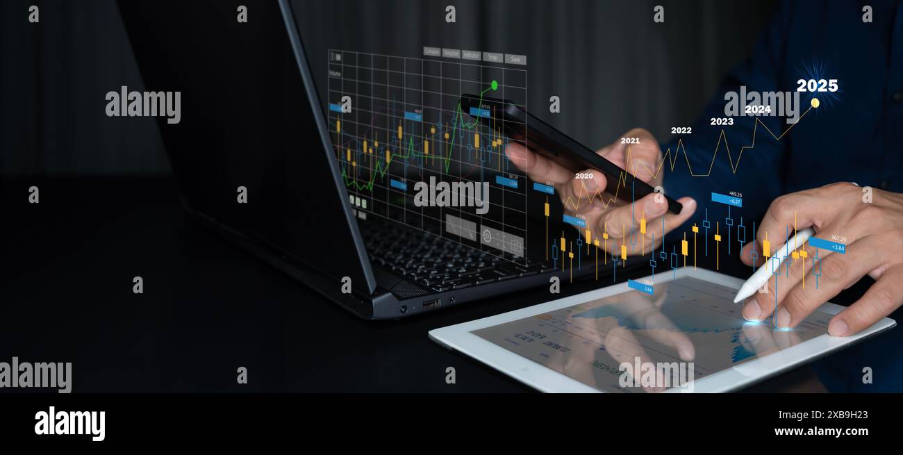 Businessman holding growth graph a year 2025 of business and data ...