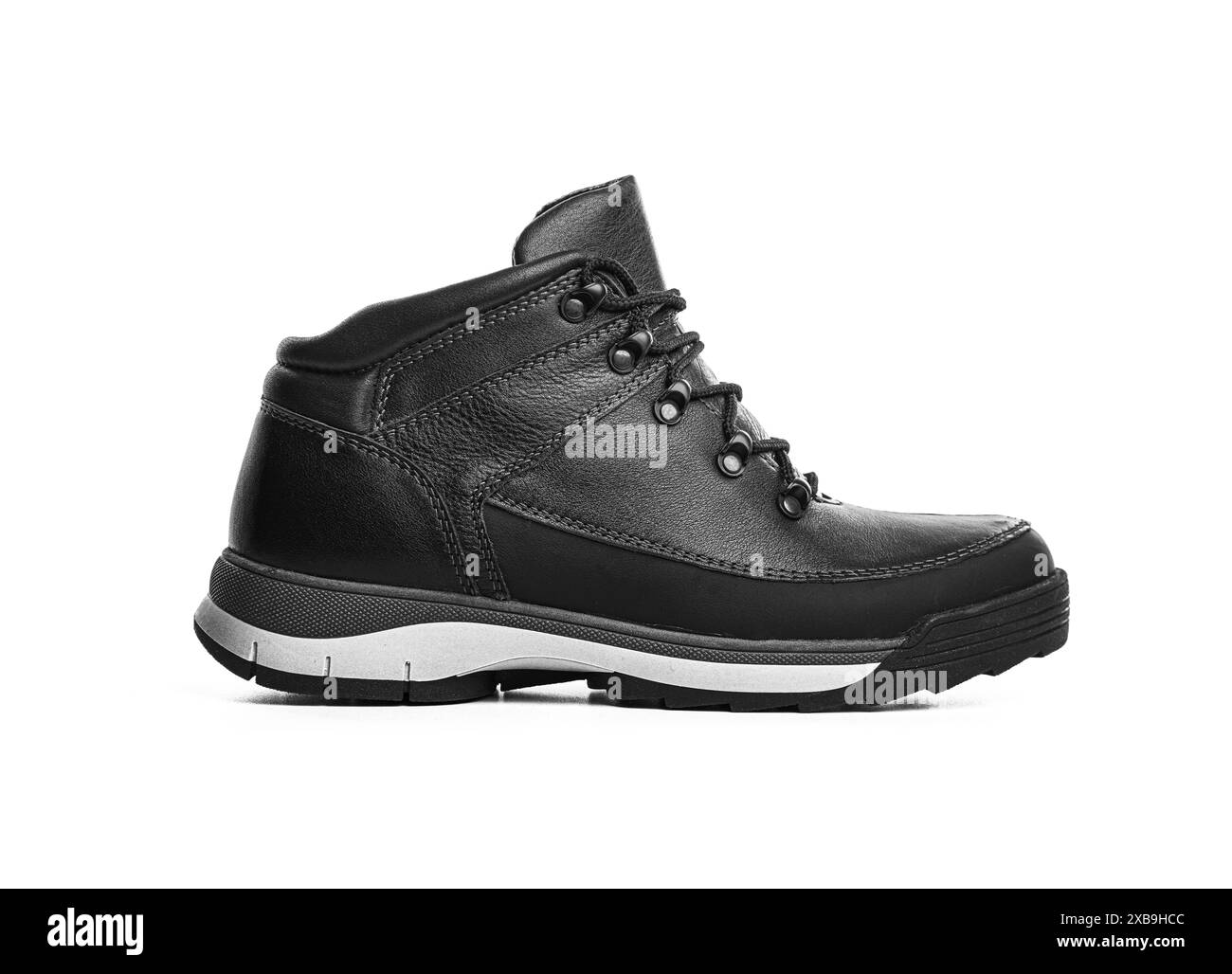 Black winter boots on a white background Stock Photo - Alamy