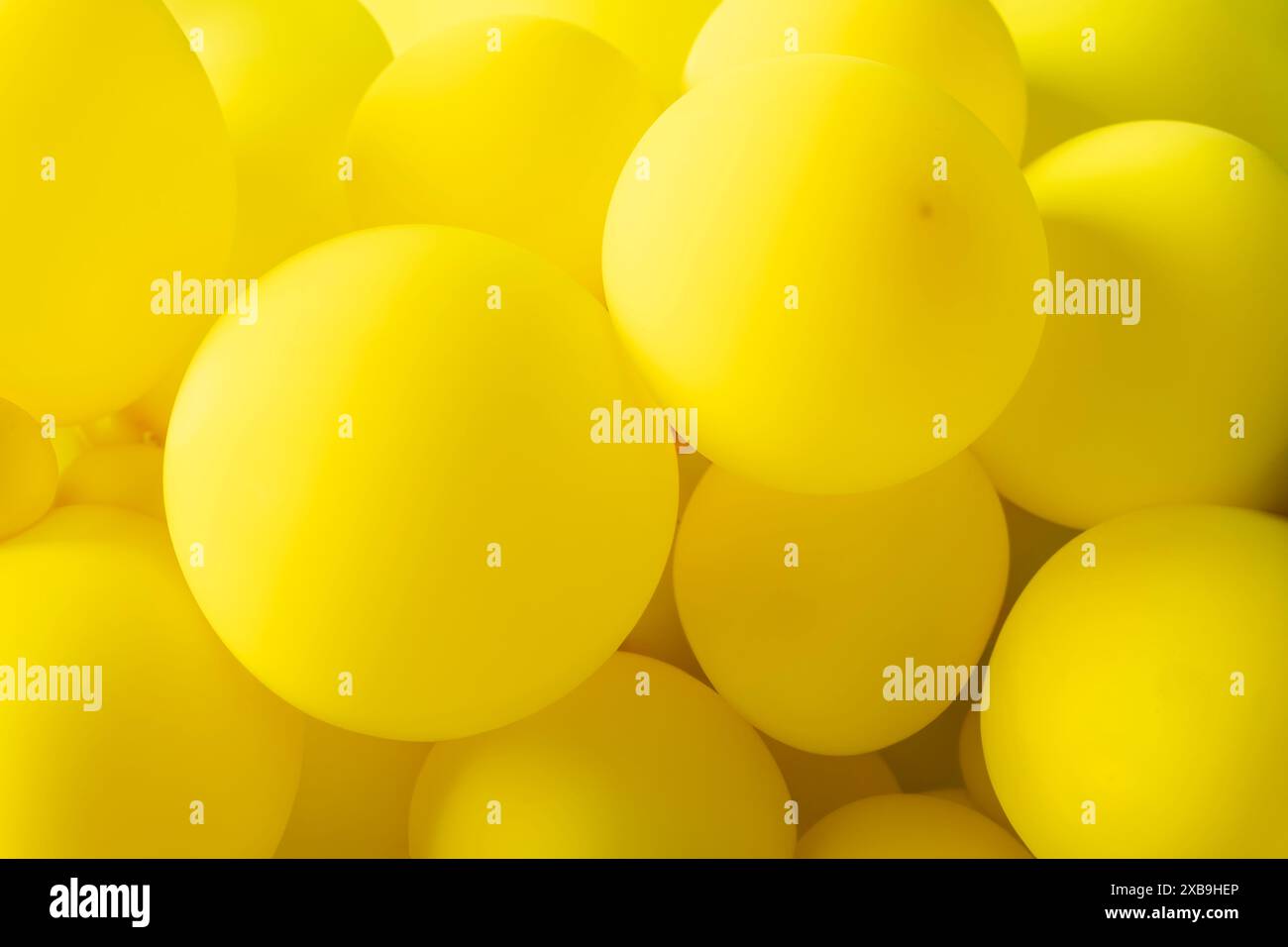 Group of yellow balloons create a background. a group of yellow ...