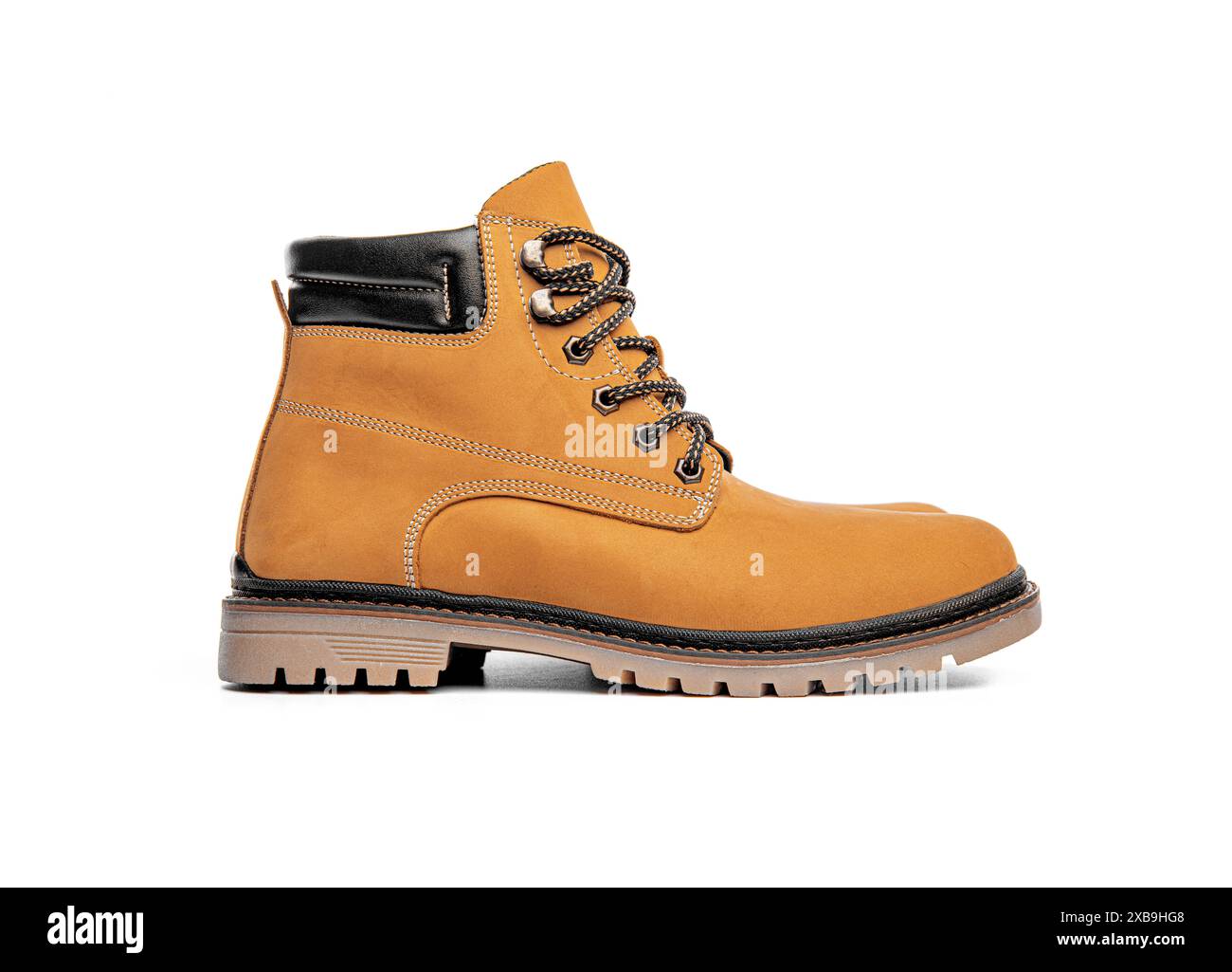 Yellow winter boot isolated on white Stock Photo - Alamy