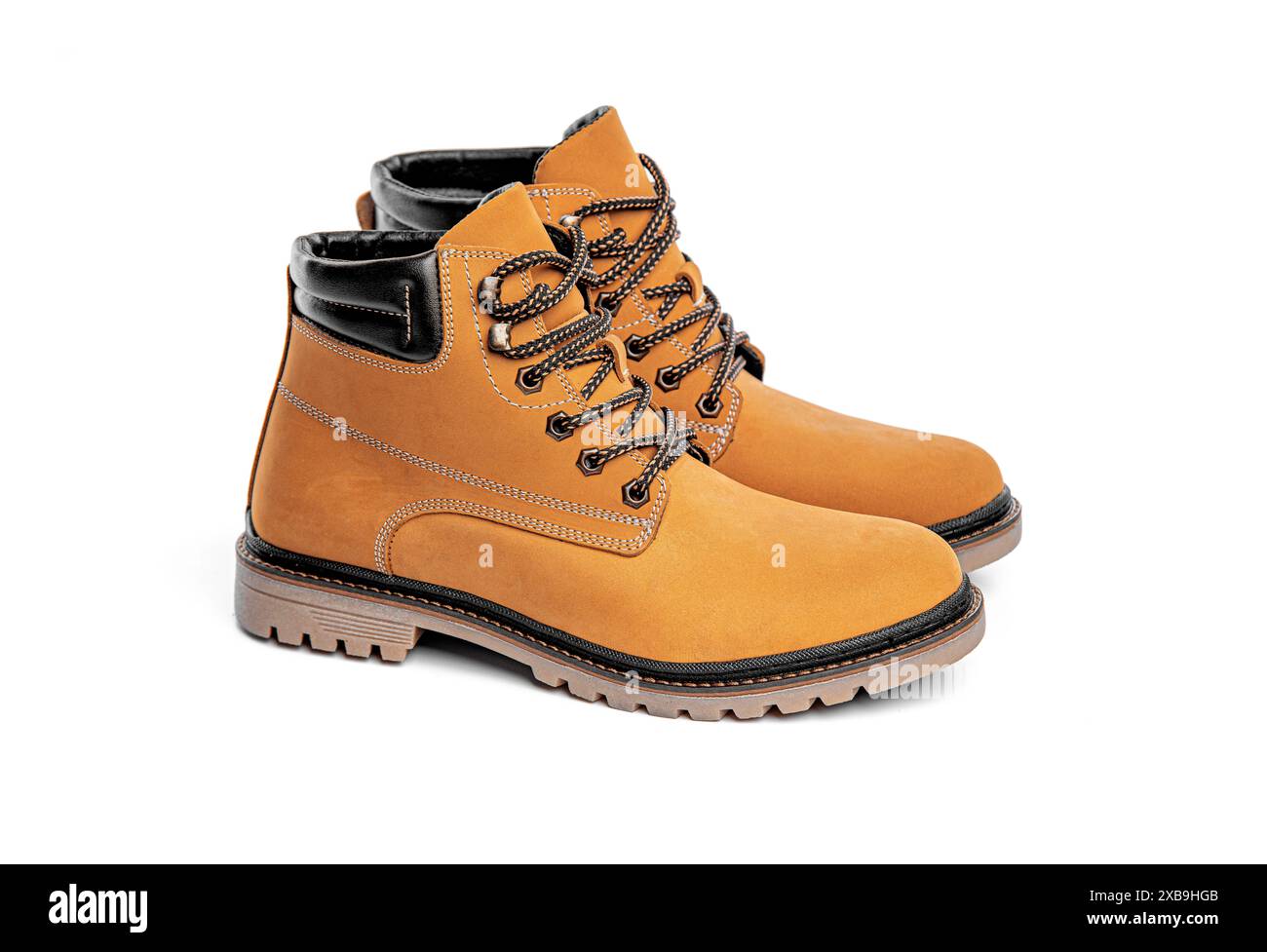 Yellow winter boot isolated on white Stock Photo - Alamy