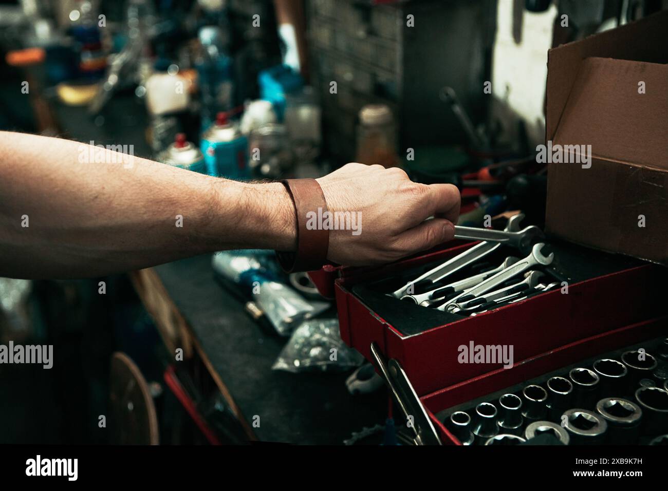 Man, hand and tool box for mechanic, spanner and upgrade or maintenance ...