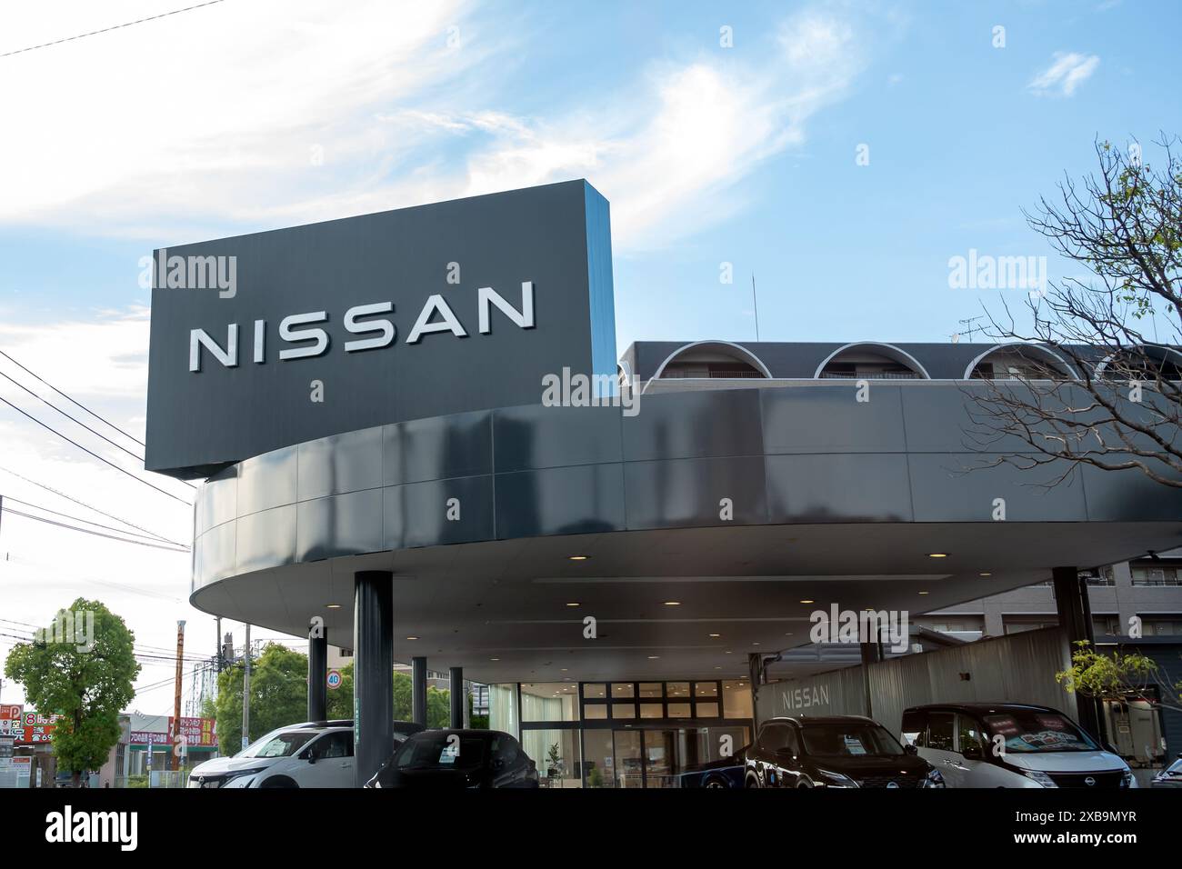 Nissan Motor Japan Car Dealer Building and Showroom Stock Photo - Alamy