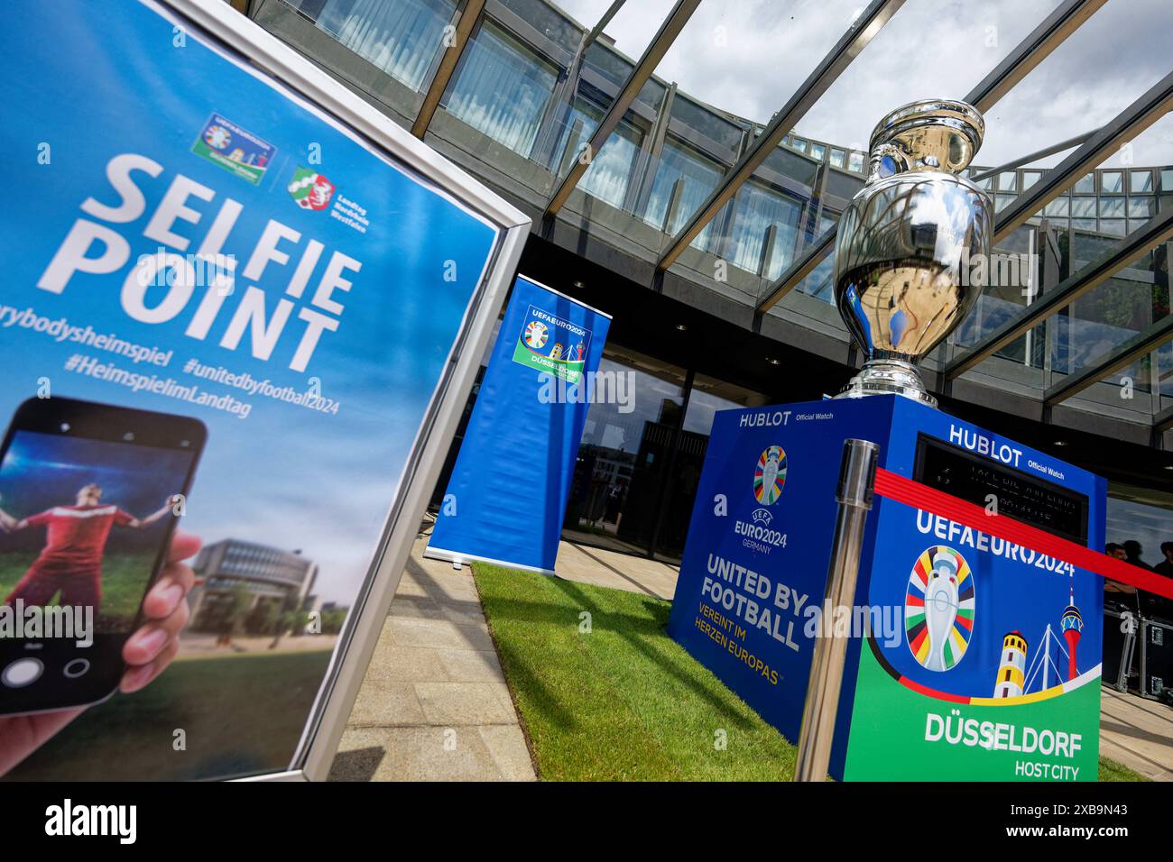 11 June 2024, North Rhine-Westphalia, Duesseldorf: The Giant Trophy, a three-meter tall replica ...