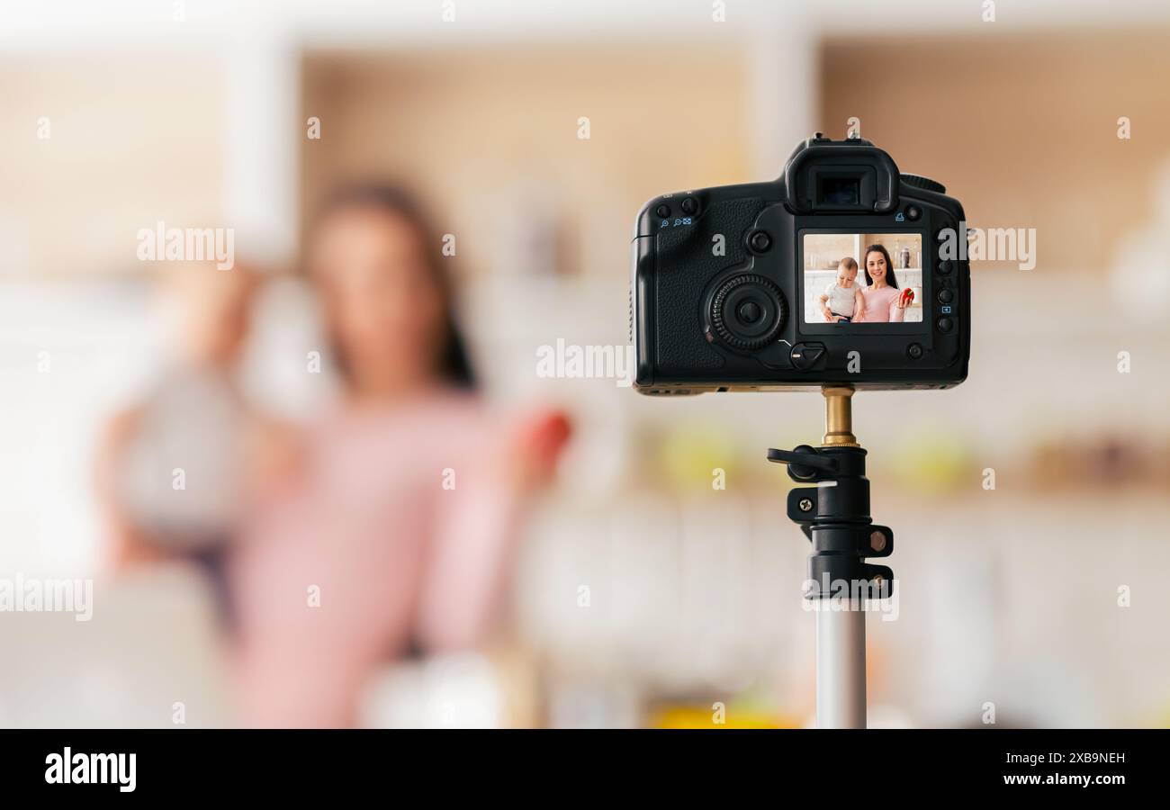 Woman Recording Cooking Tutorial in Modern Kitchen During Daytime Stock ...