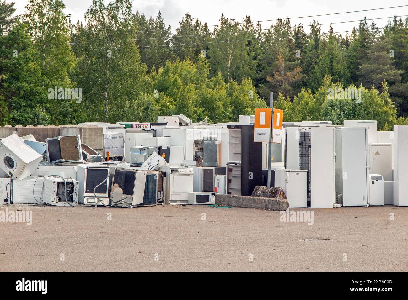Old discarded white goods at a recycling station in Sweden Stock Photo ...