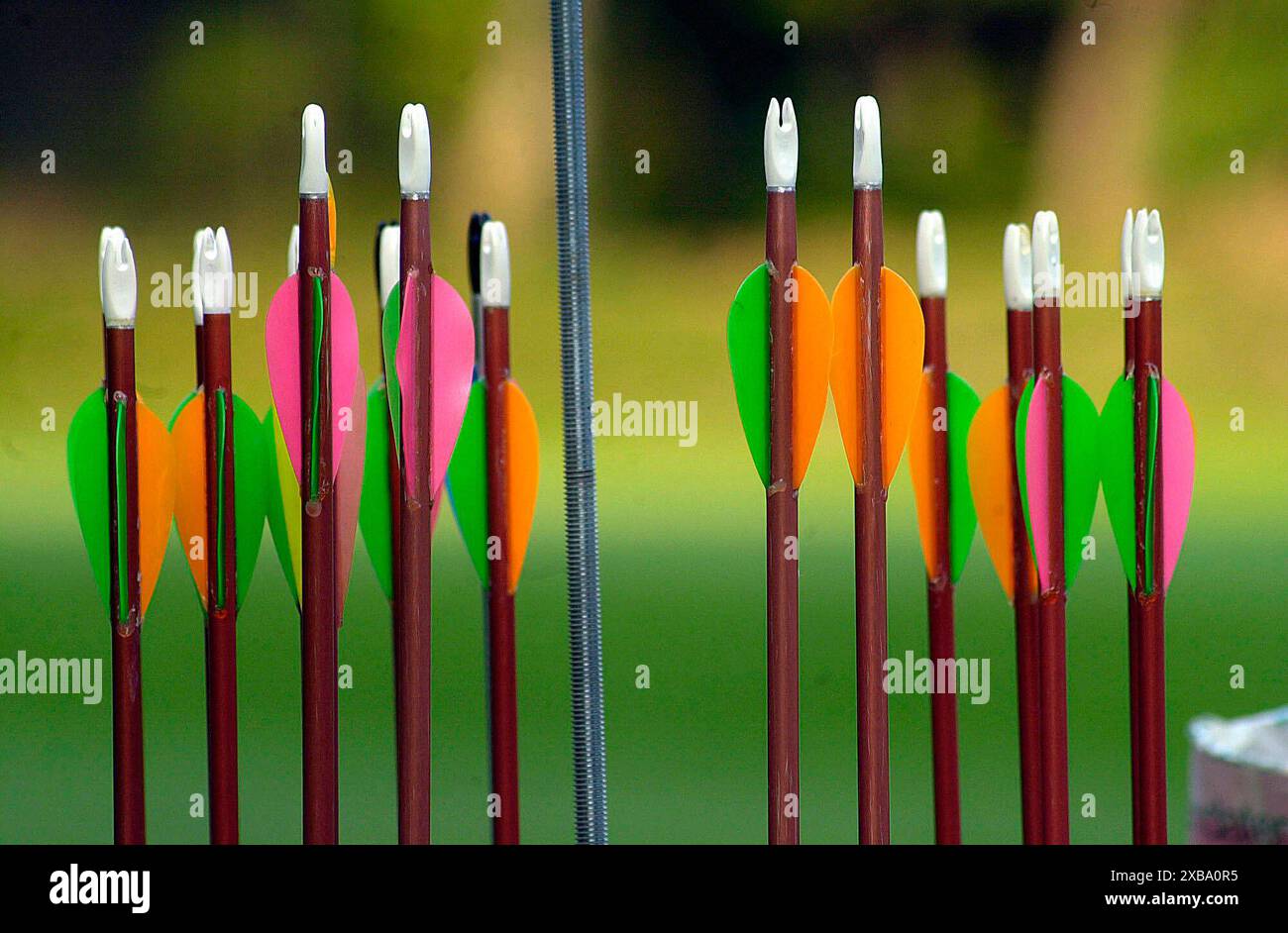 Archer with a bow and arrow aiming in the twilight Archer with bow and ...